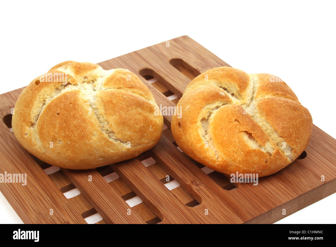 Bread and buns isolated against a white background Stock Photo - Alamy
