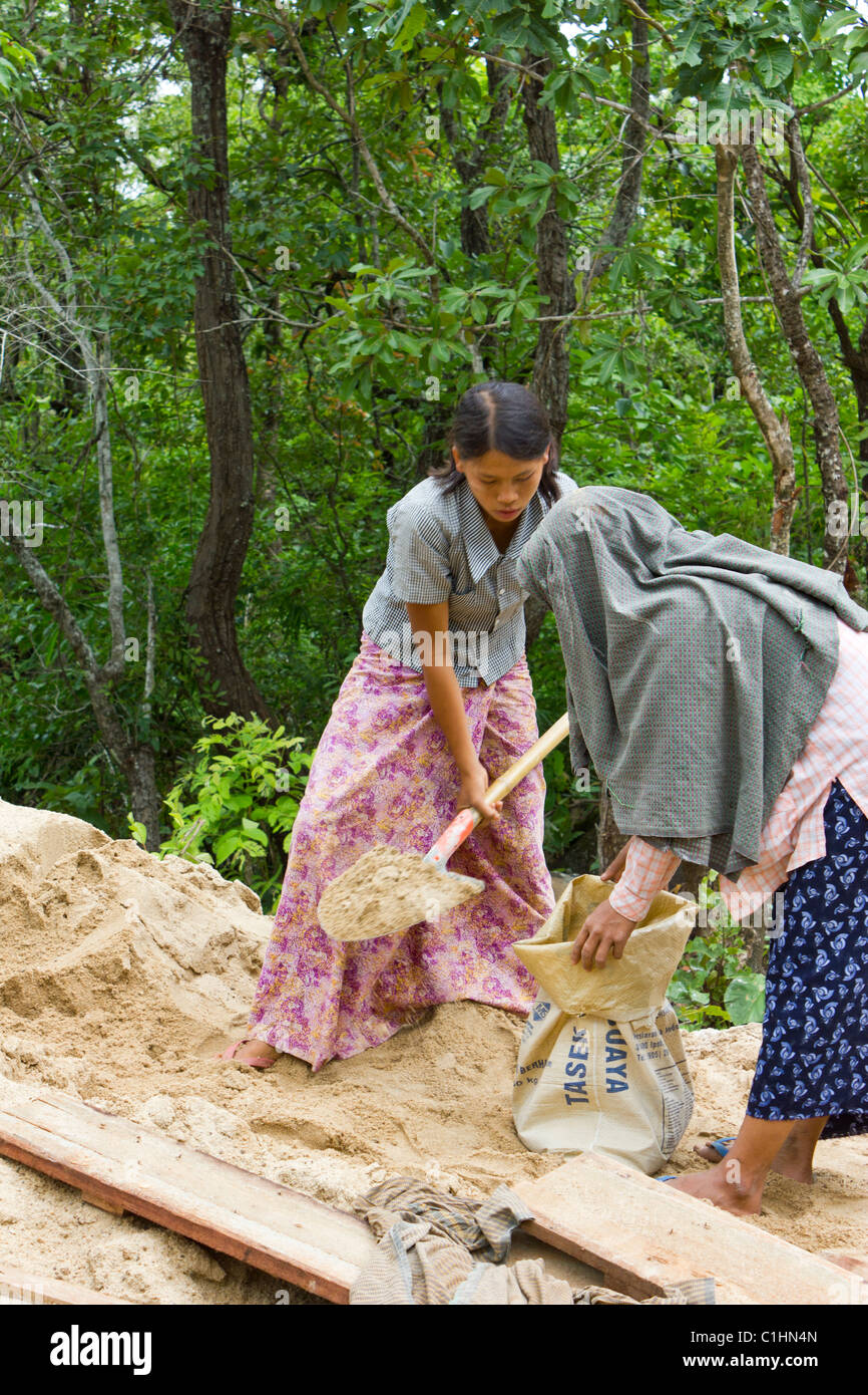 Burmese girls labouring on building site near Taung Kalat , Mount Popa ...