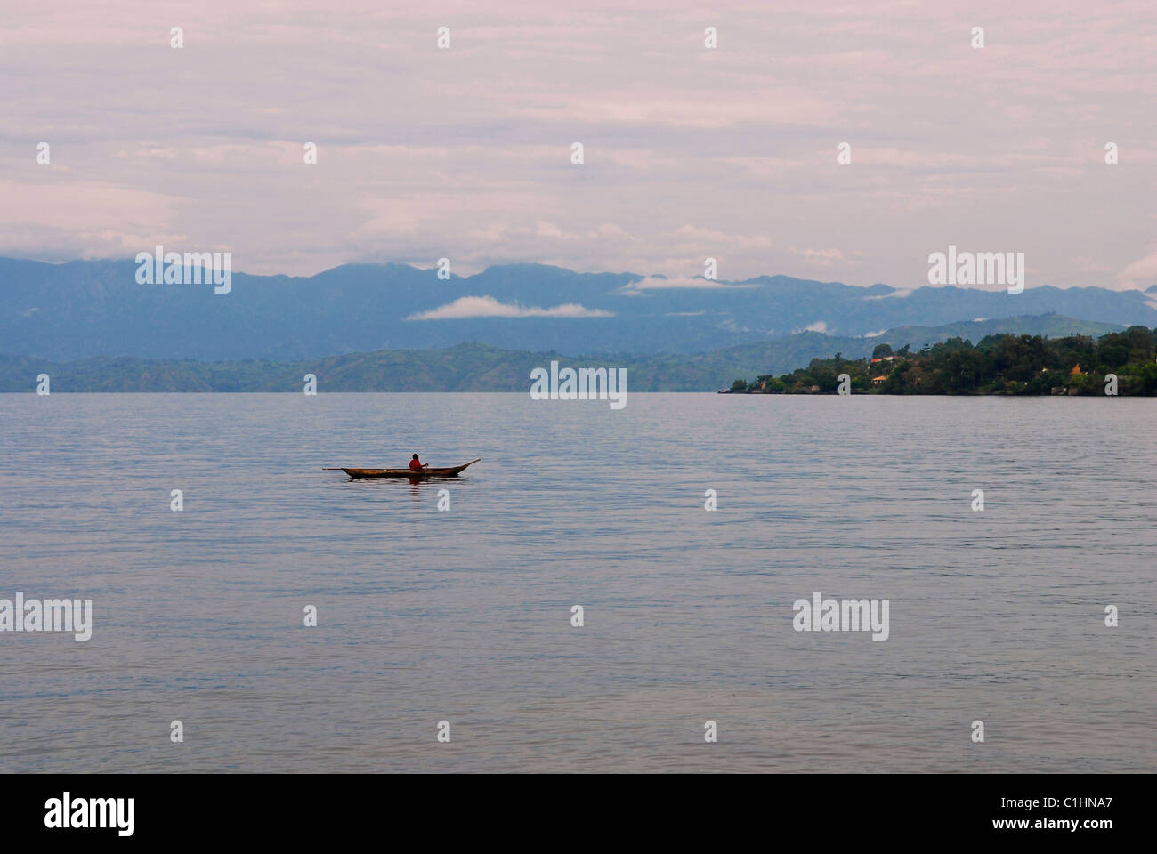 Man boating in a fishing boat in Lake Kivu North Kivu province, DR ...
