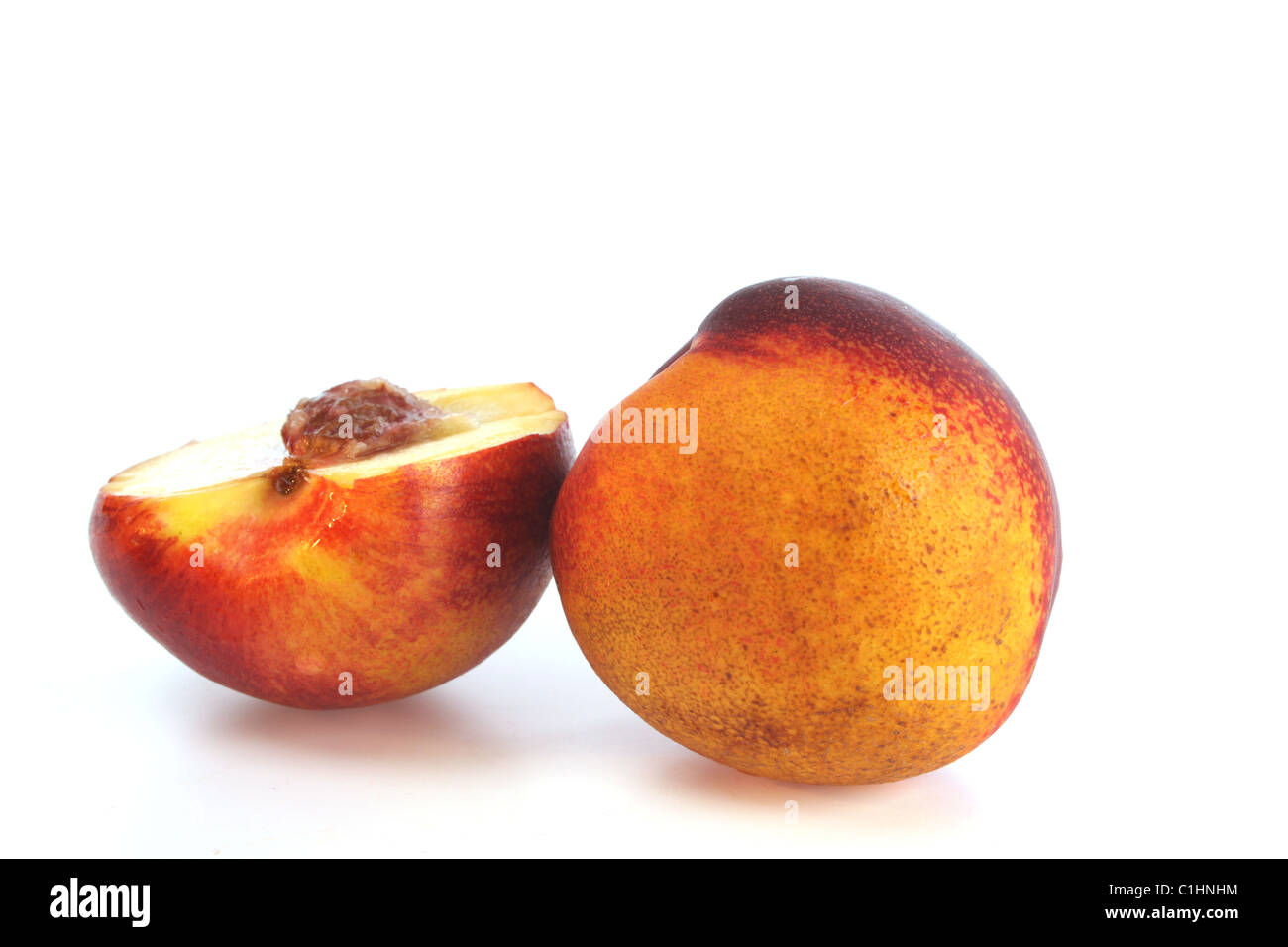 Tangelo isolated against a white background Stock Photo - Alamy