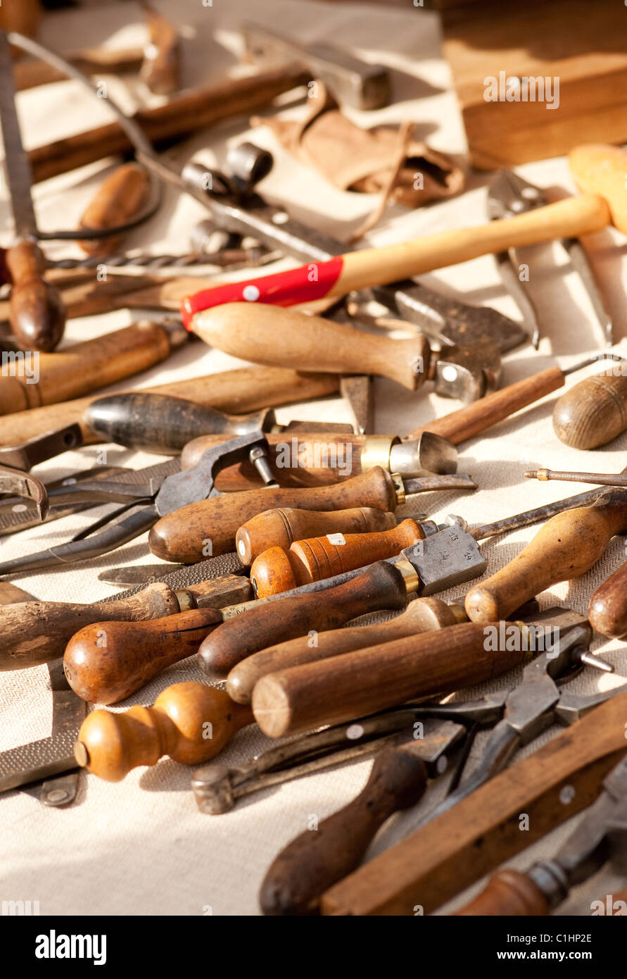 Different tools on sale at flea market in Paris, France Stock Photo - Alamy