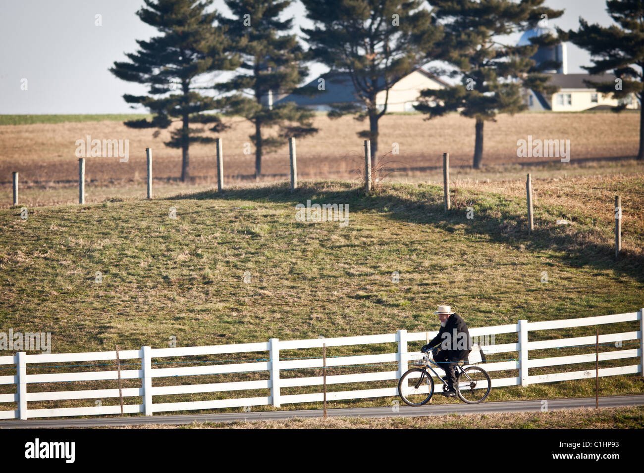 Amish riding bike bicycle hi-res stock photography and images - Alamy