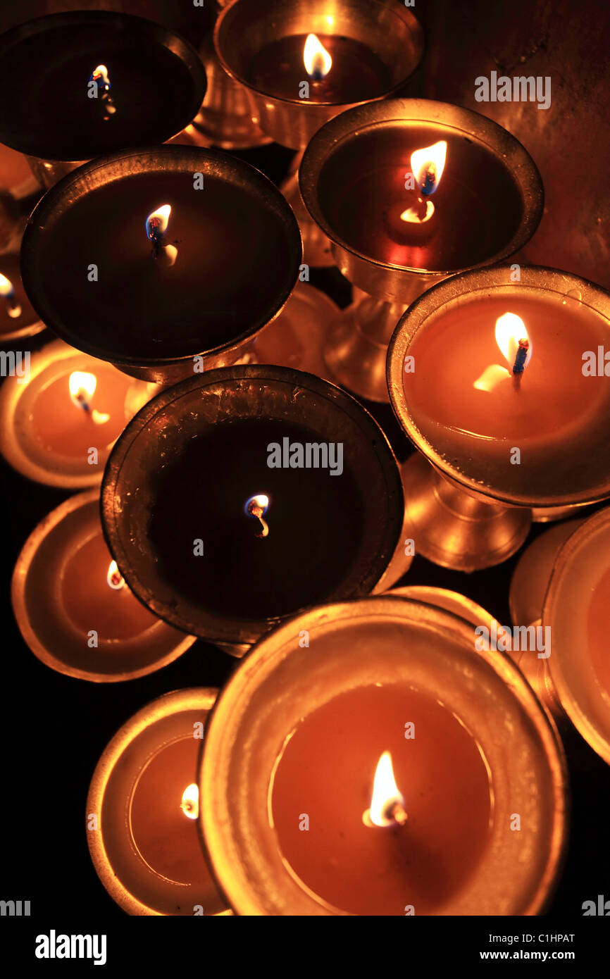 Buddhist oil lamps hi-res stock photography and images - Alamy