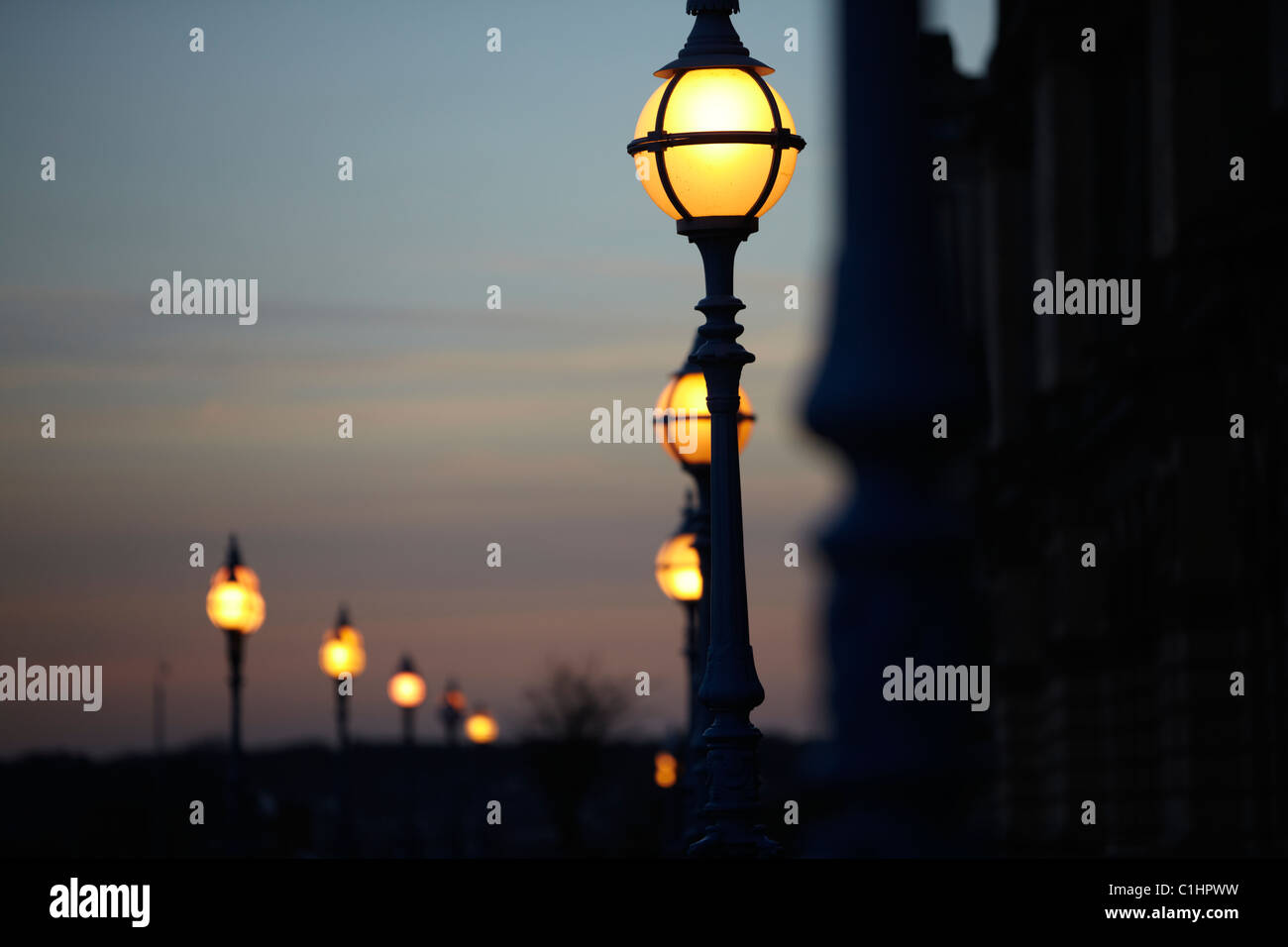 Romantic street lights at twilight Stock Photo - Alamy
