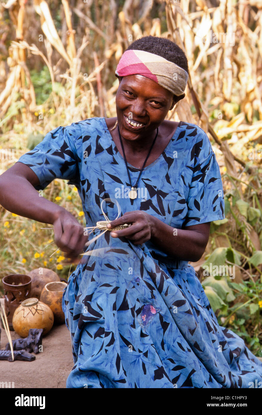 Woman weaving basket in Felasha (Jewish) village of Wolleka, Ethiopia ...