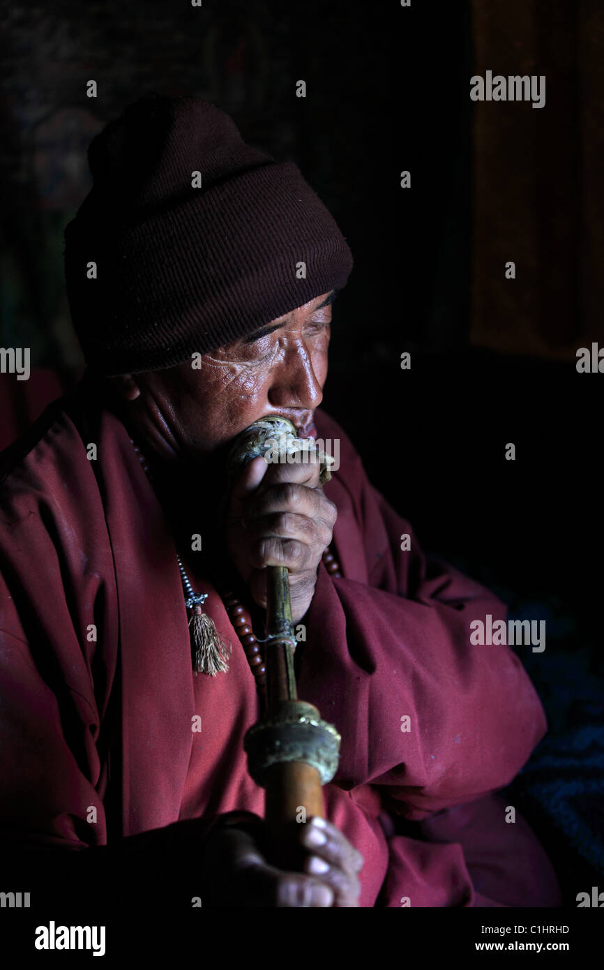 Buddhist lama during rituals in Nepal Himalaya Stock Photo - Alamy