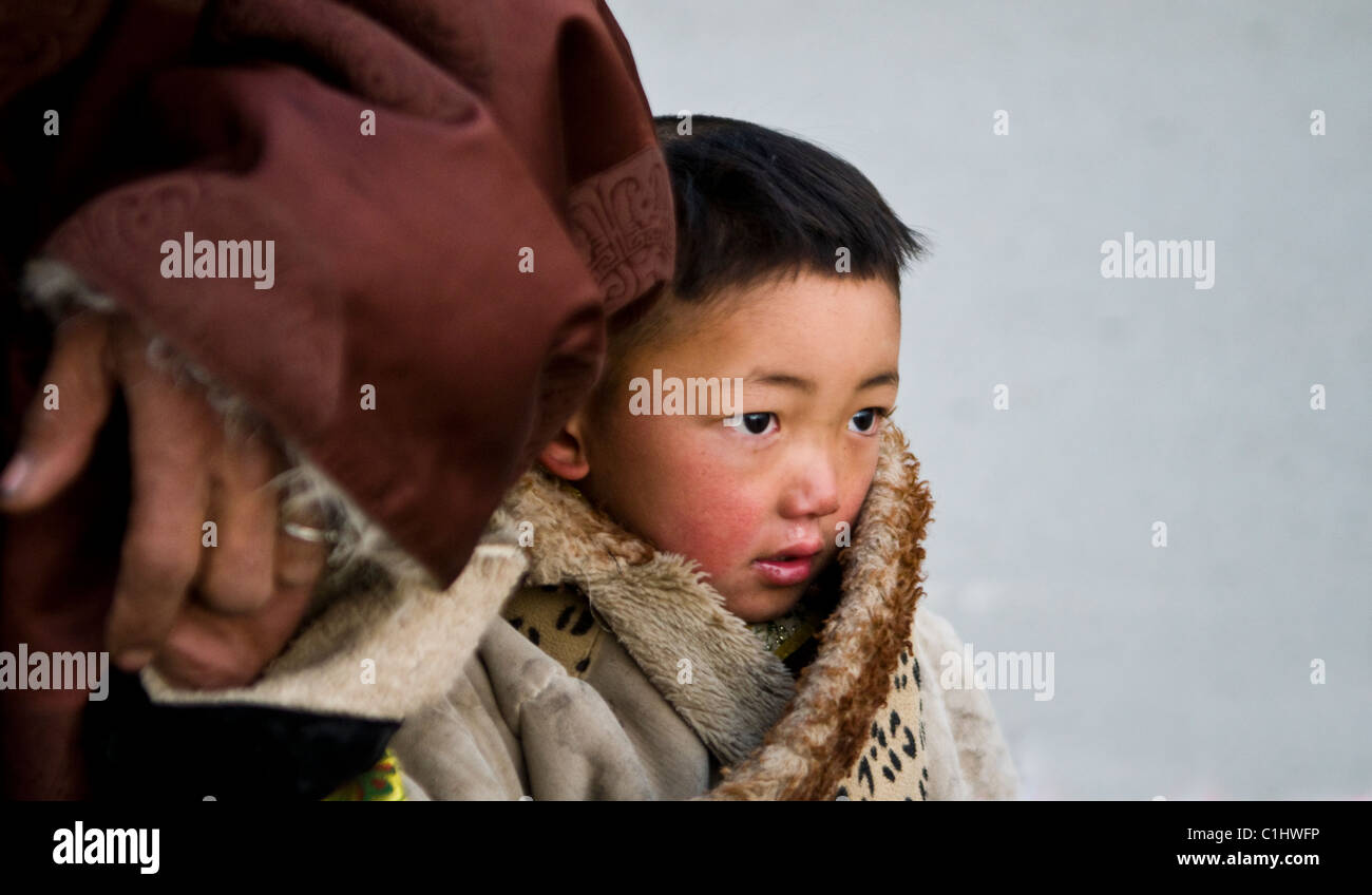 A cute Tibetan boy Stock Photo - Alamy