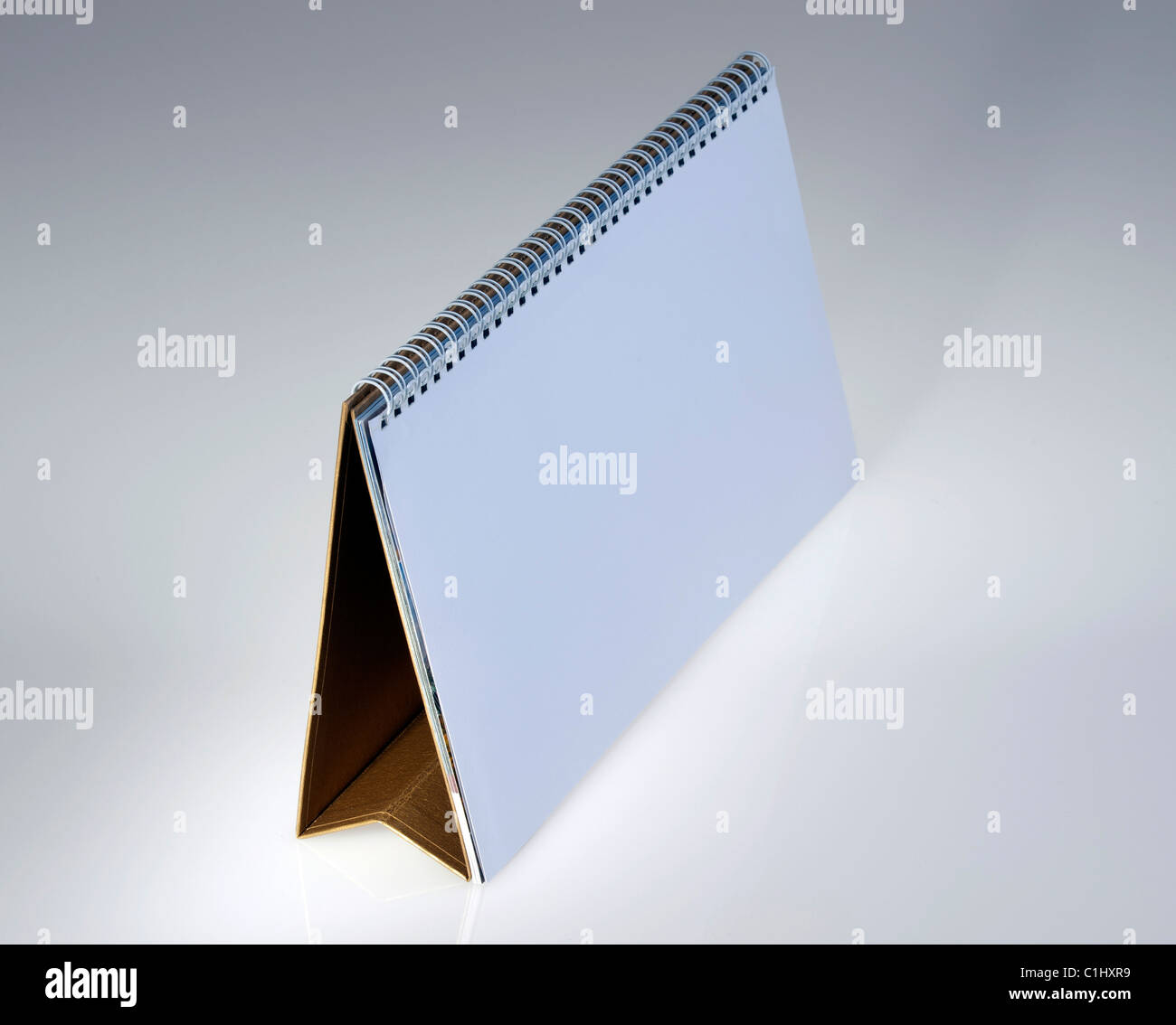 Weekly desk calendar with plain, white cover Stock Photo - Alamy