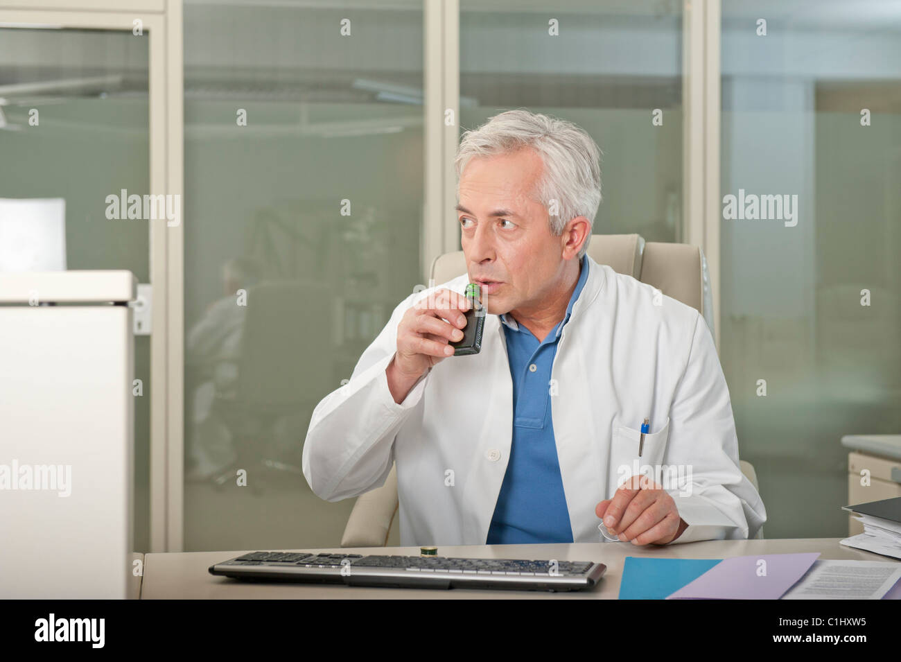 Doctor drinking alcohol hi-res stock photography and images - Alamy