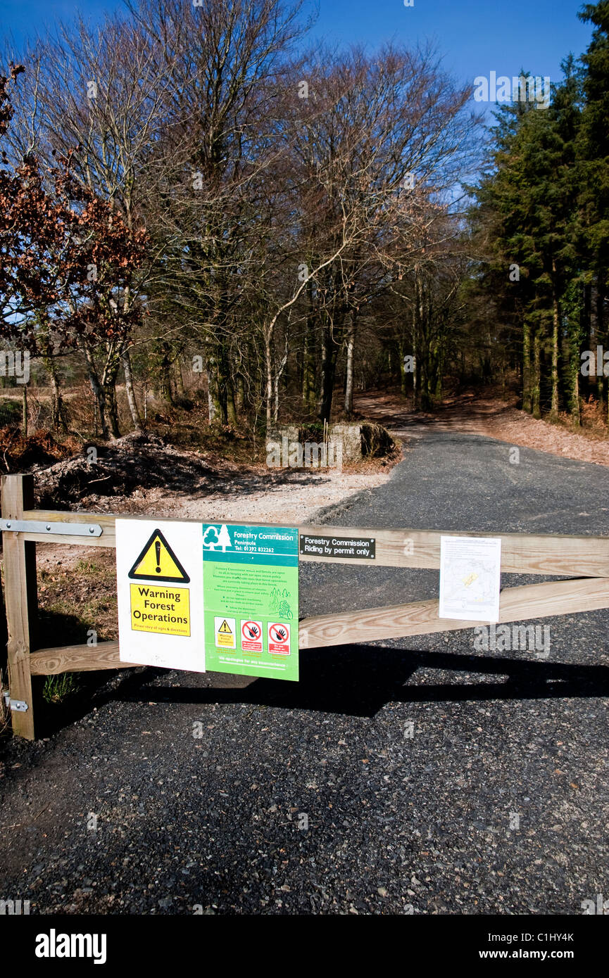 Warning signs on a gate, which leads into a Forestry Commision ...