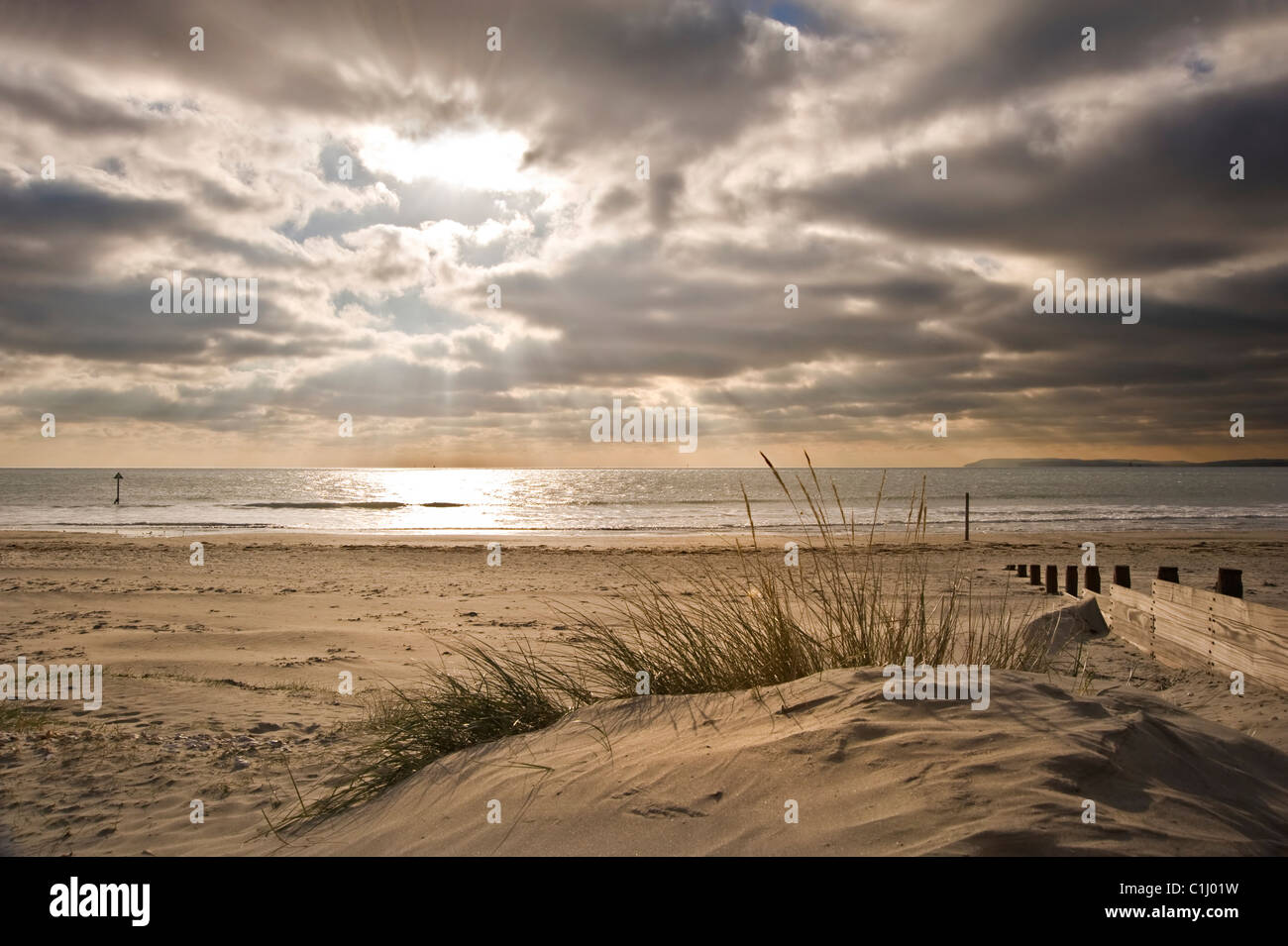 Stunning inspirational sunset image with glowing sun beams Stock Photo ...