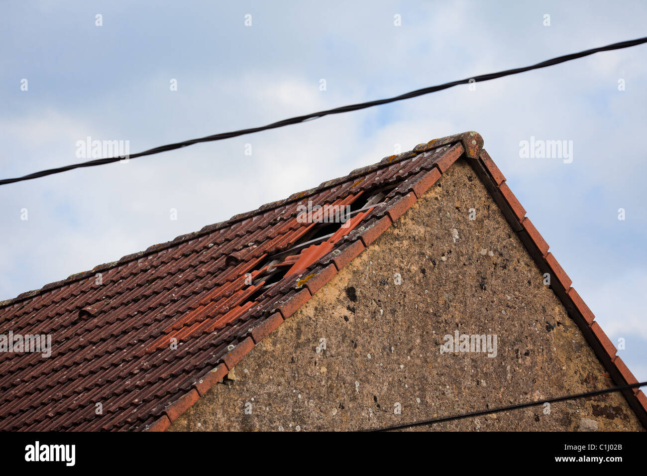 Damaged roof hi-res stock photography and images - Alamy