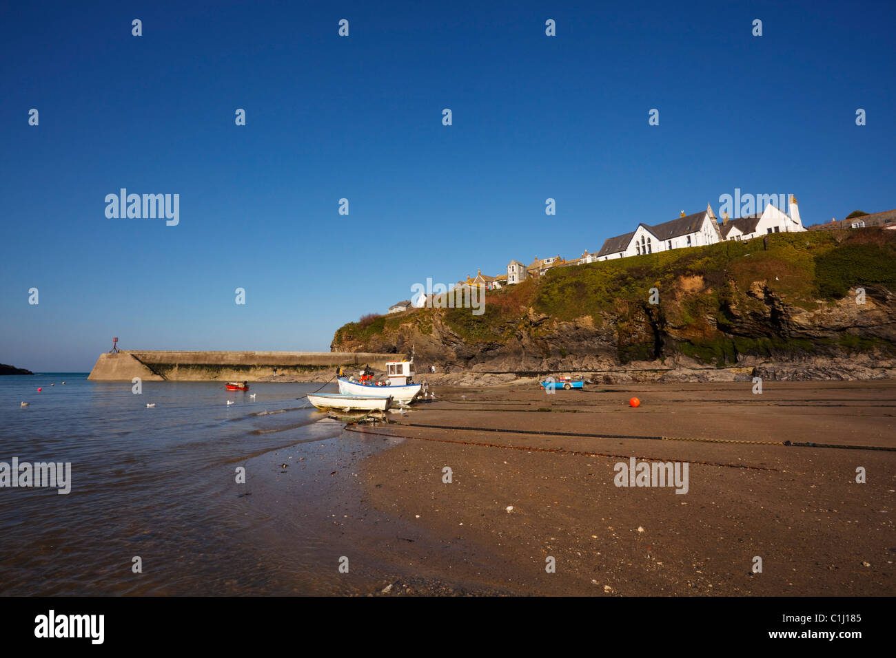 Wide angle view of Port Isaac Harbour. The setting is used as Portwenn ...