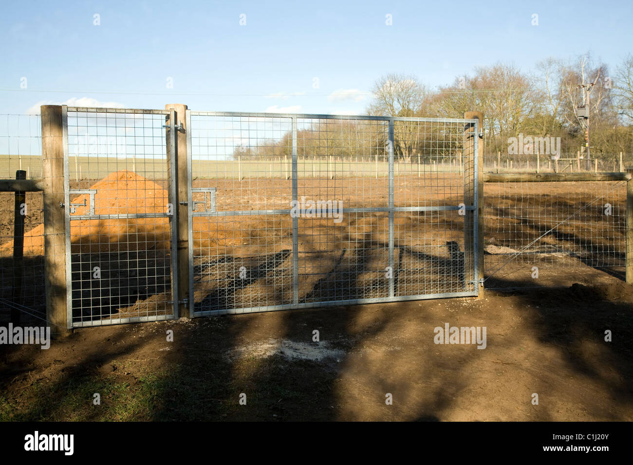 Large metal gates new Stock Photo - Alamy