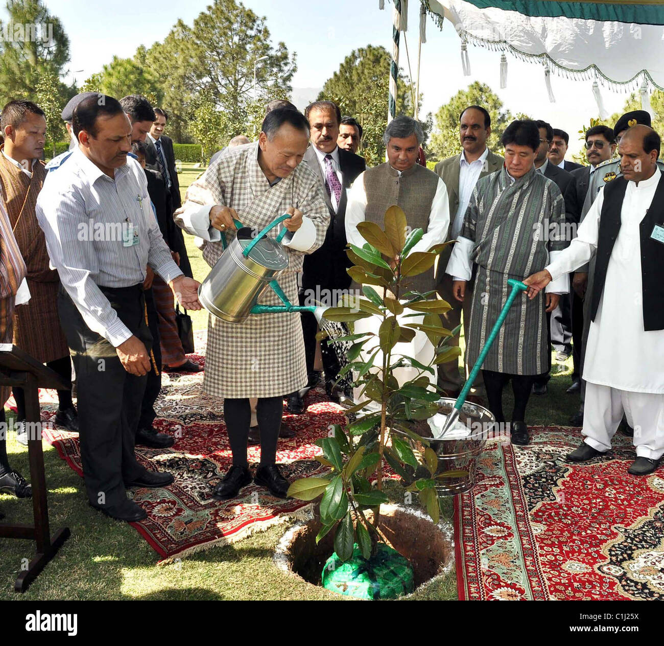 Waters a sapling islamabad hi-res stock photography and images - Alamy