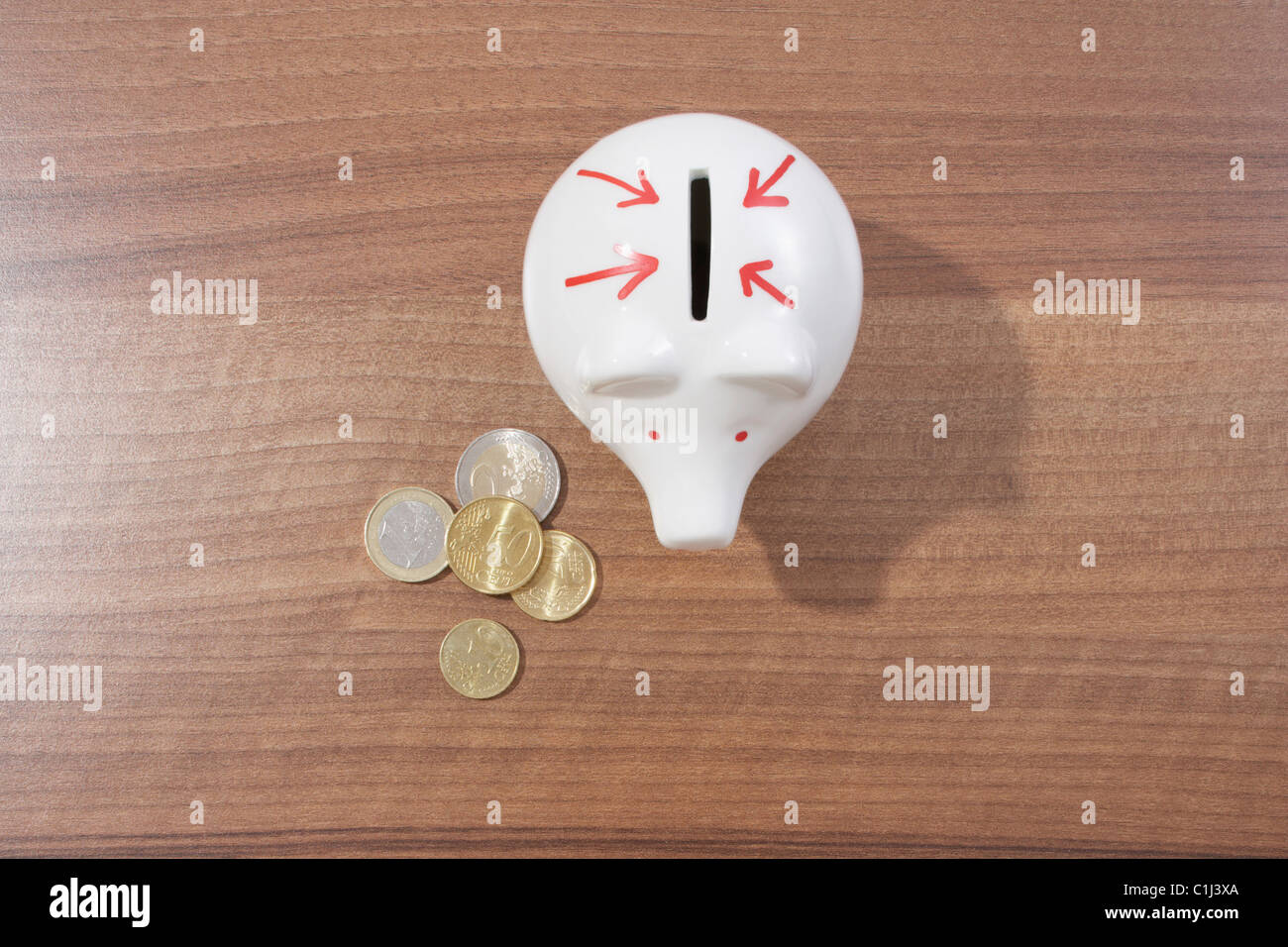 Piggy Bank and Euro Coins Stock Photo - Alamy