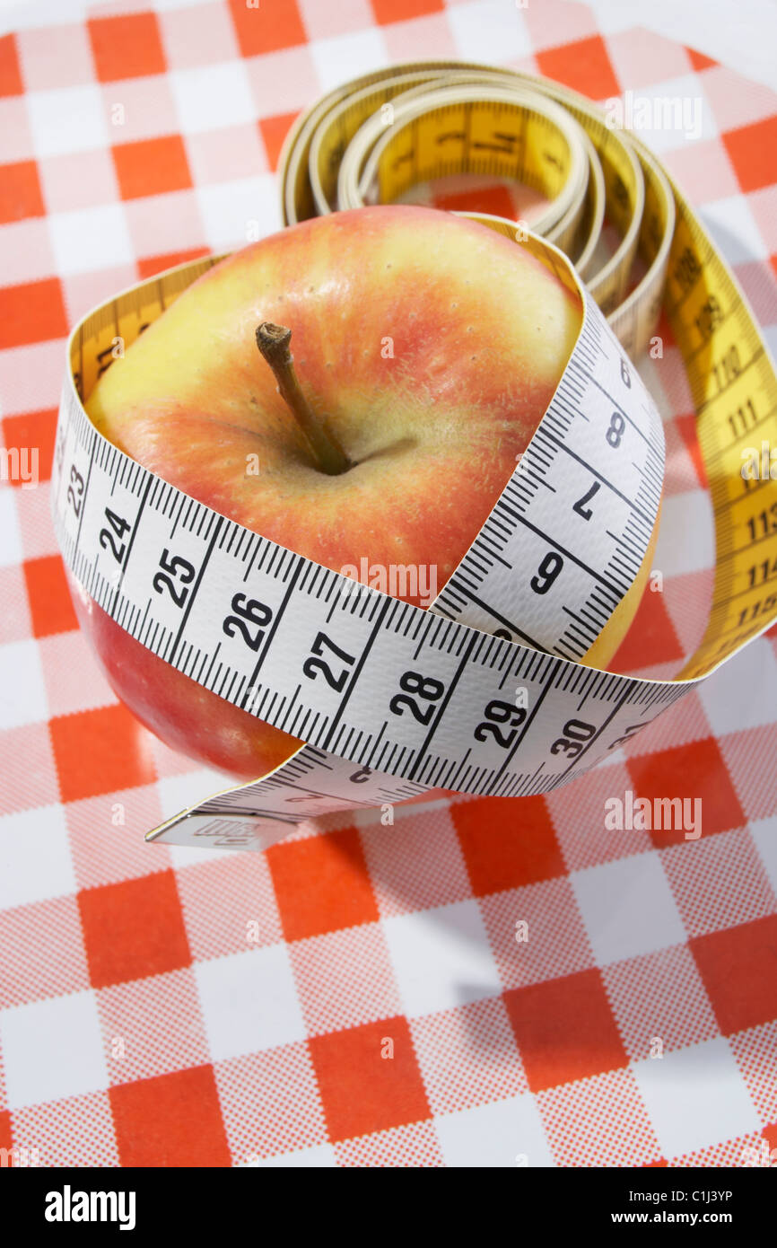Apple with Tape Measure Stock Photo - Alamy