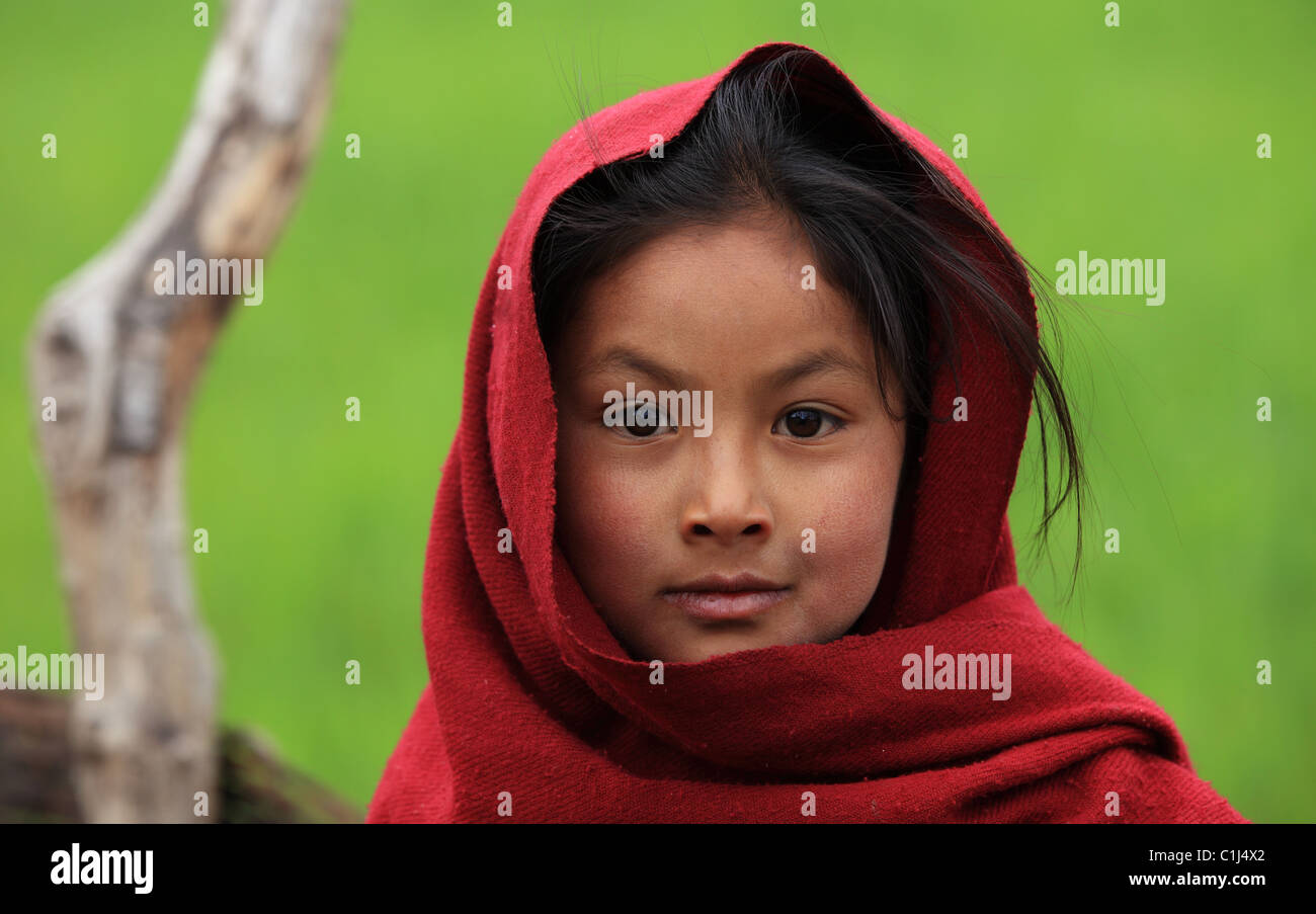 Nepali girl in the hills of Nepal Stock Photo - Alamy