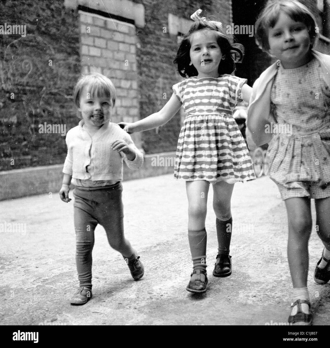 Children Playing Outside 1950s High Resolution Stock Photography and ...