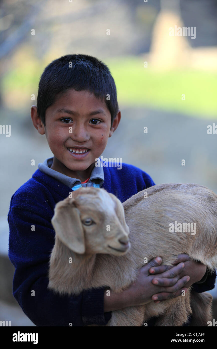 Boy with goat hi-res stock photography and images - Alamy