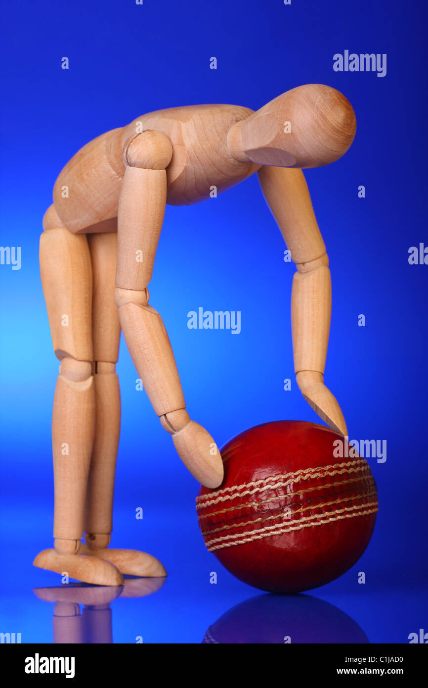 mannequin cricket player retrieving cricket ball Stock Photo - Alamy