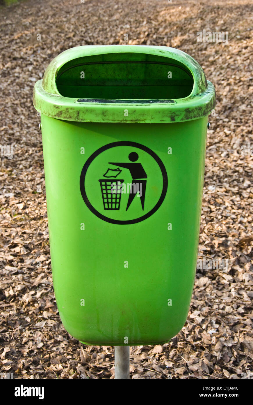 green litter bin in park Stock Photo - Alamy