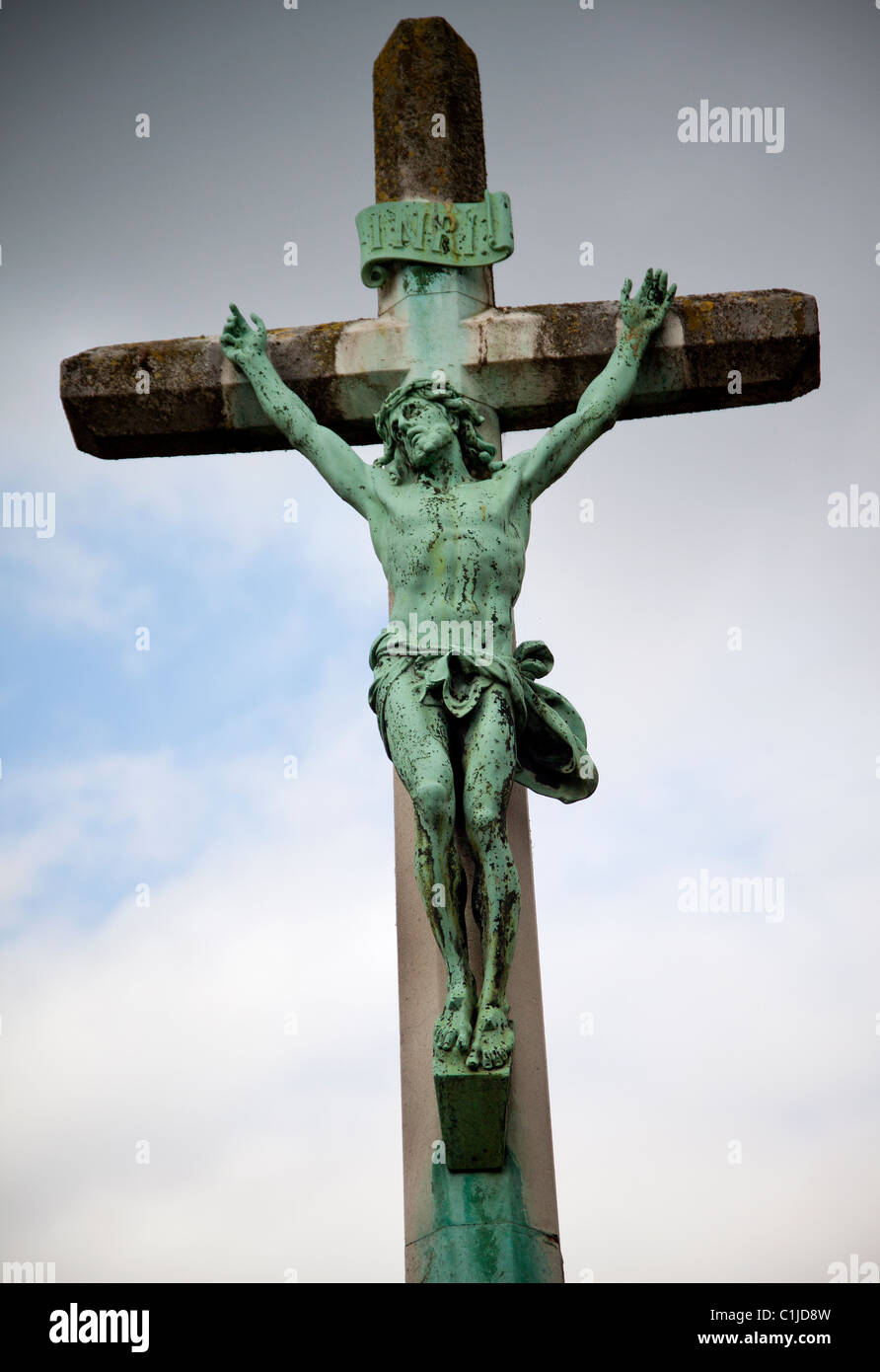 Stone Cross with Jesus Christ Stock Photo - Alamy