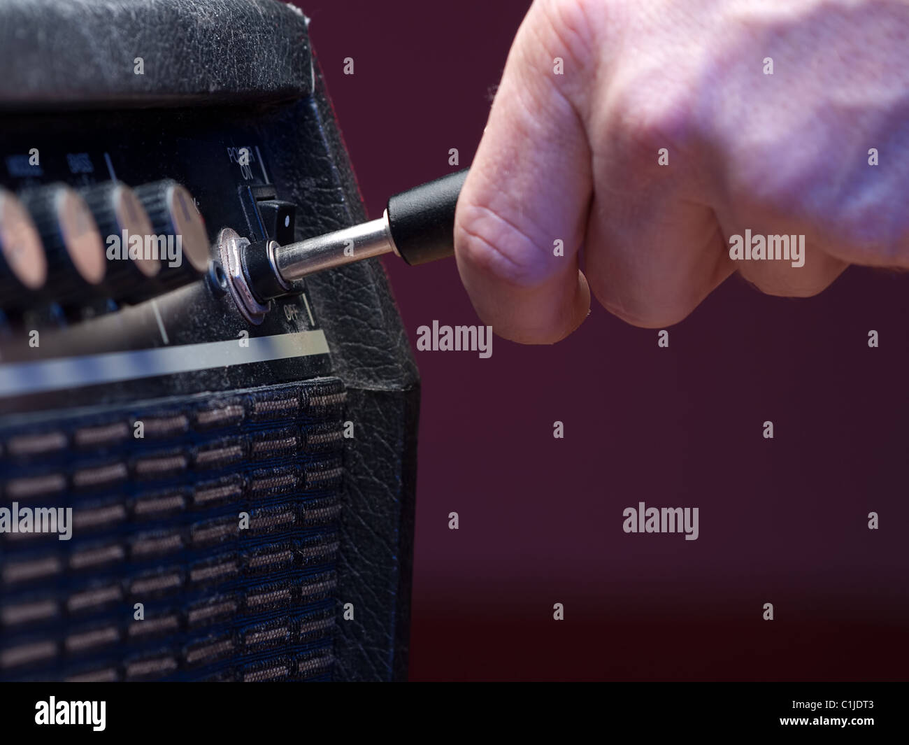 Plugged in guitar hi-res stock photography and images - Alamy