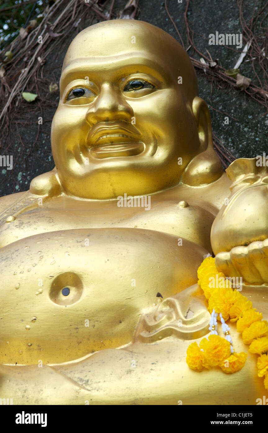 Fat gold buddha hi-res stock photography and images - Alamy