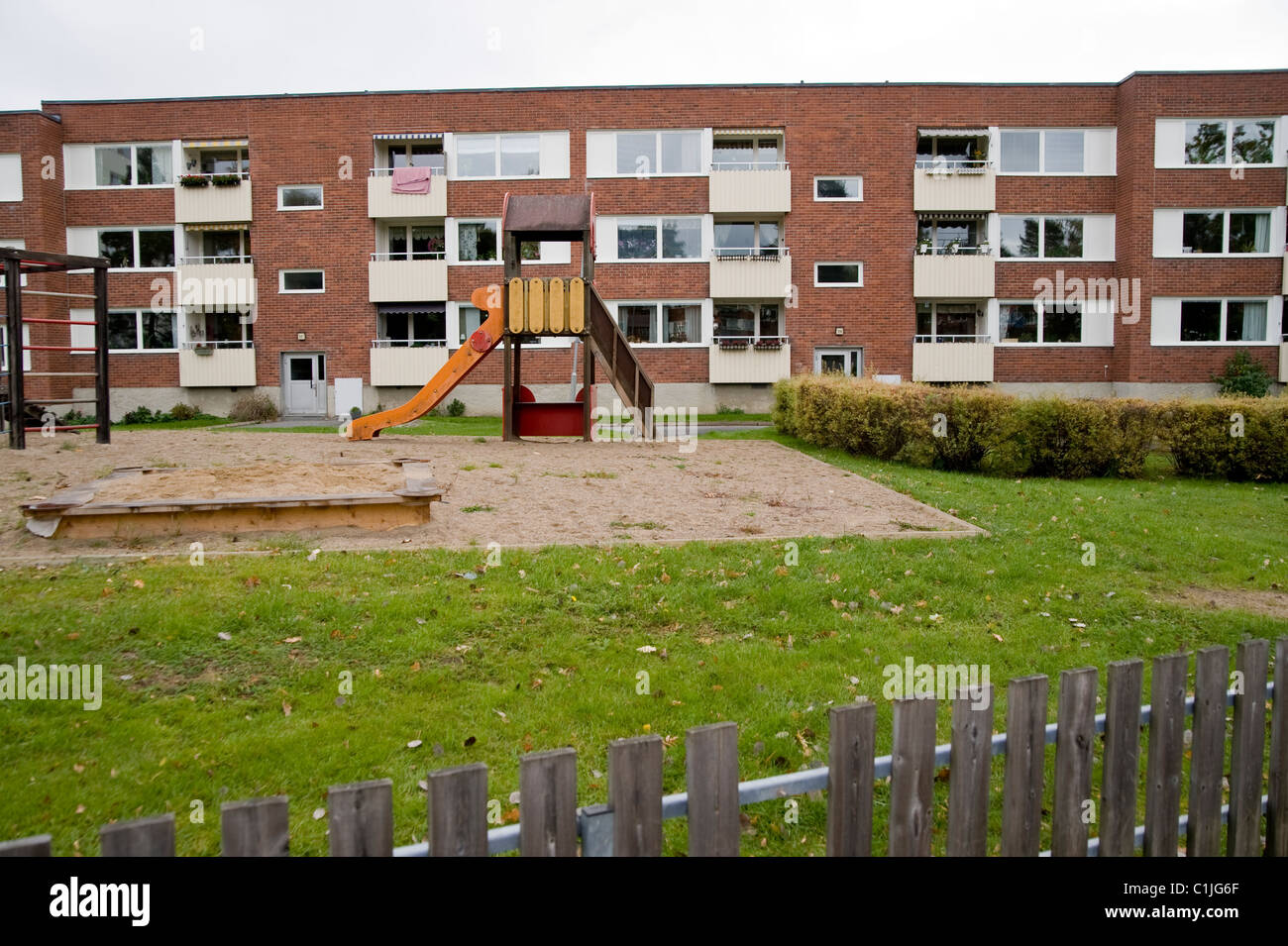 Brick house, suburb, playground, apartments, mansion Stock Photo - Alamy