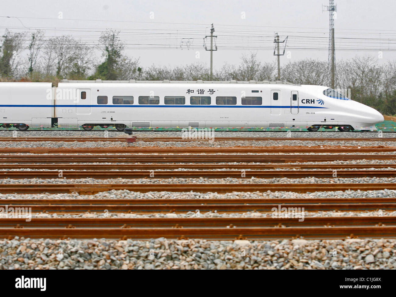 Chinese Supertrain Workers on China's new super high speed rail link ...