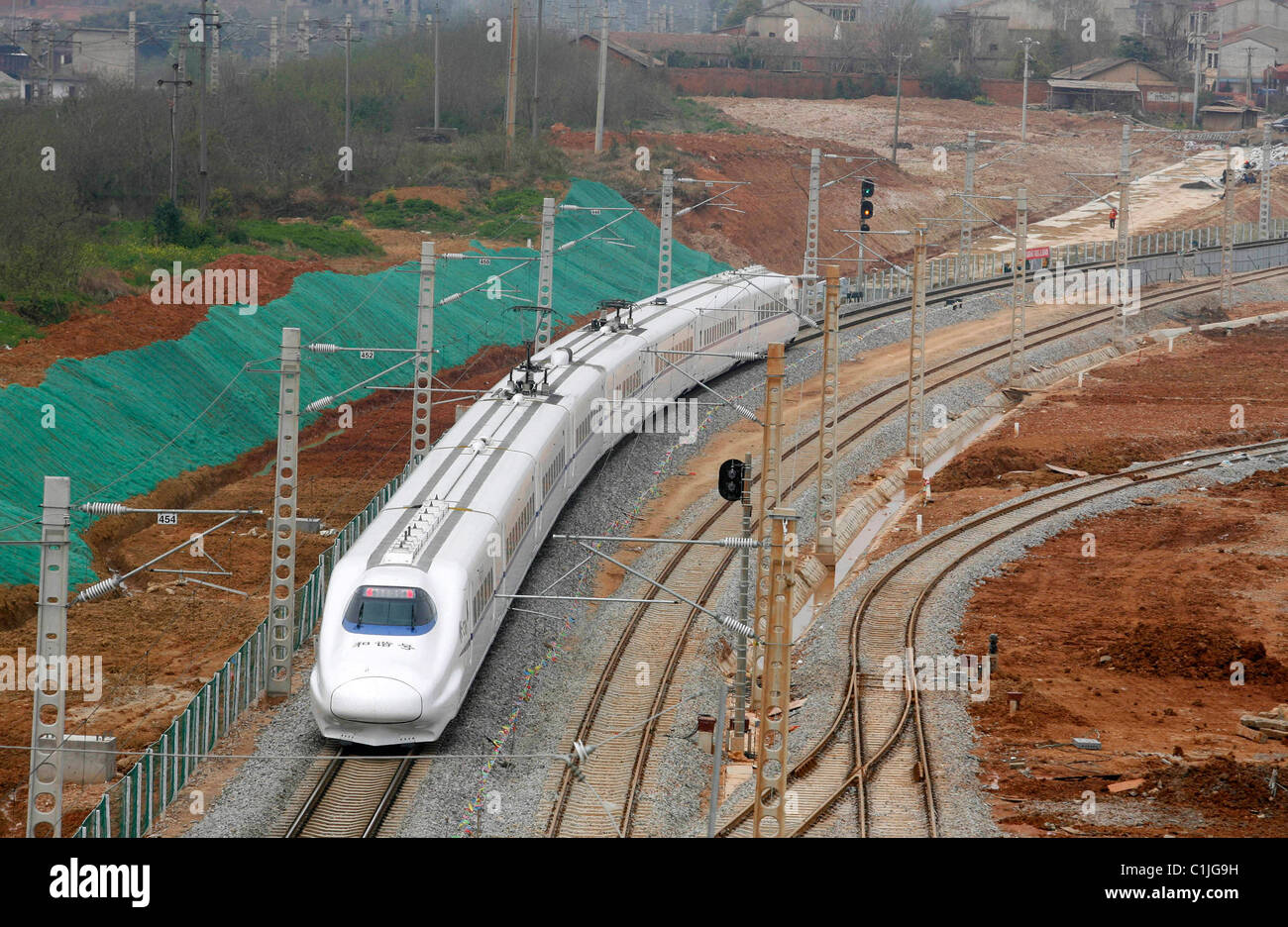 Chinese Supertrain Workers on China's new super high speed rail link ...