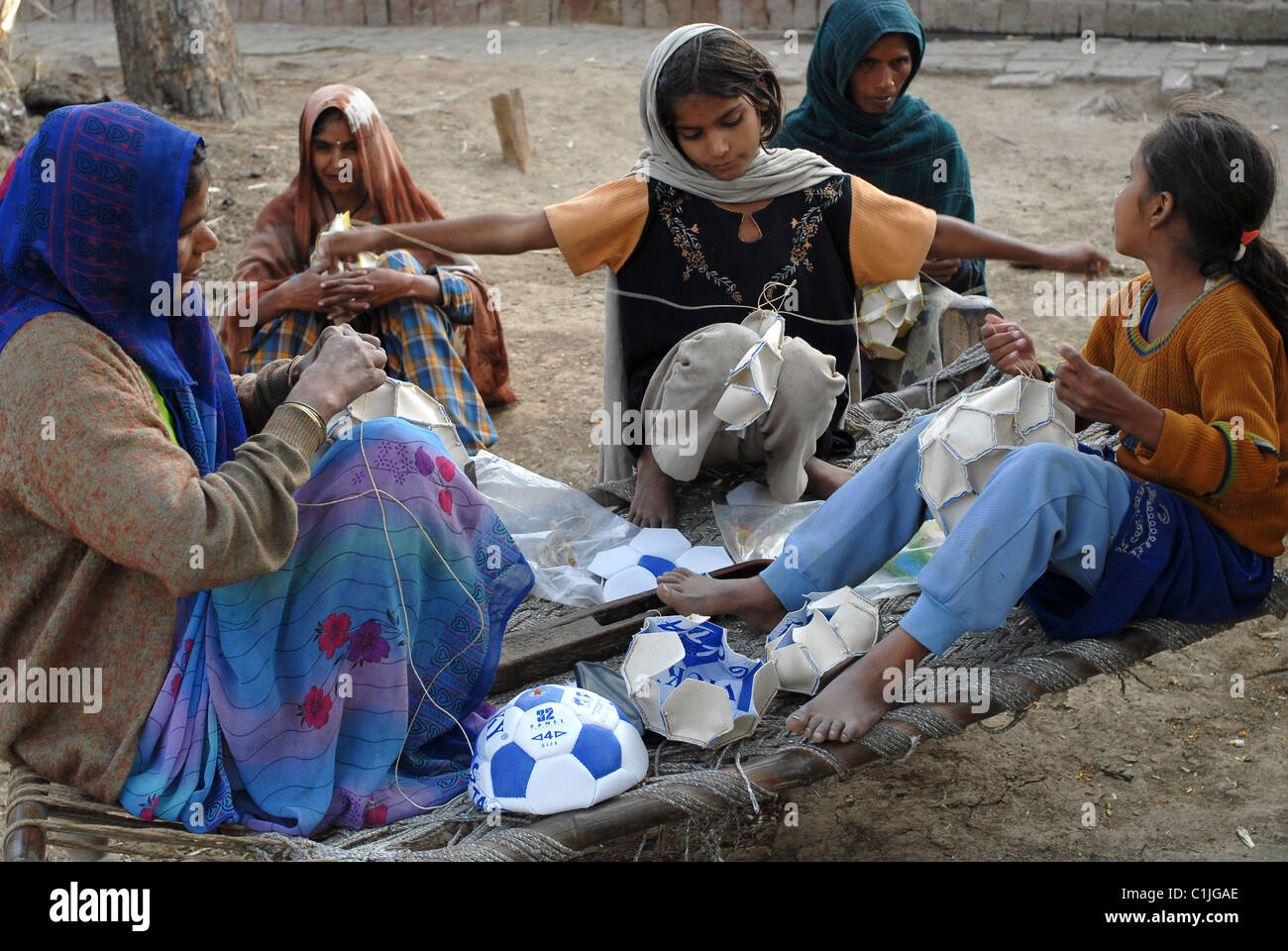 Soccer ball child labour hi-res stock photography and images - Alamy