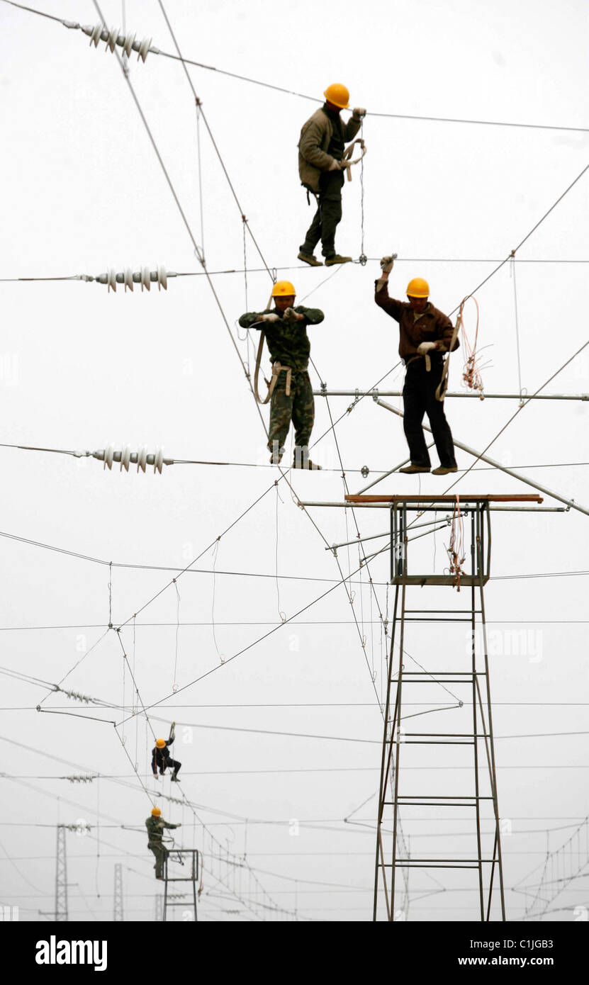 Chinese Supertrain Workers on China's new super high speed rail link ...