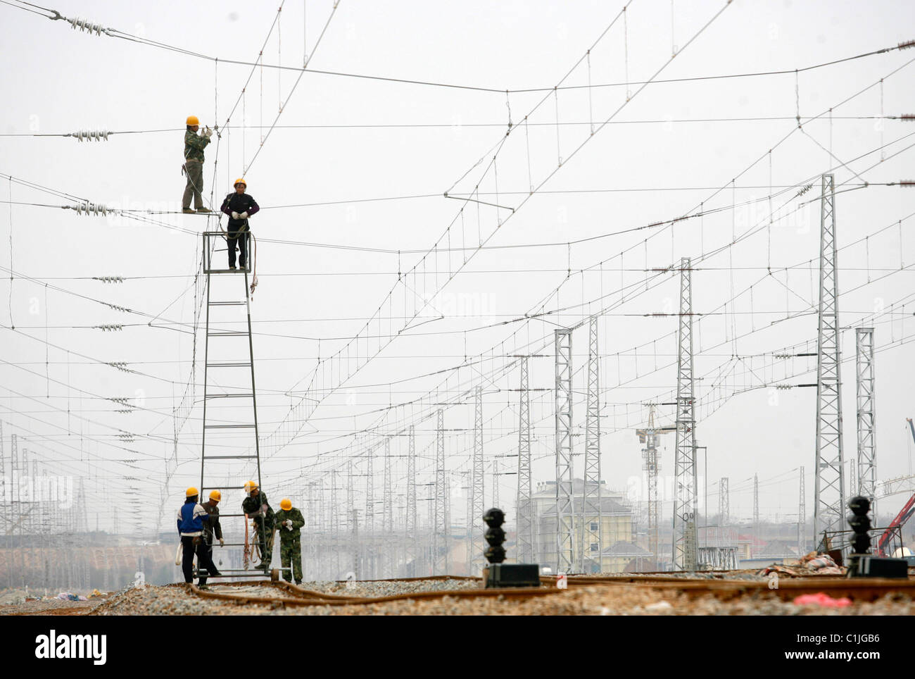 Chinese Supertrain Workers on China's new super high speed rail link ...