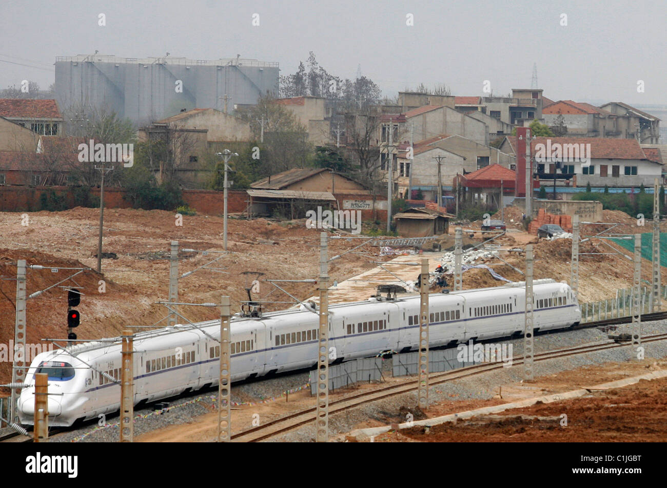 Chinese Supertrain Workers on China's new super high speed rail link ...