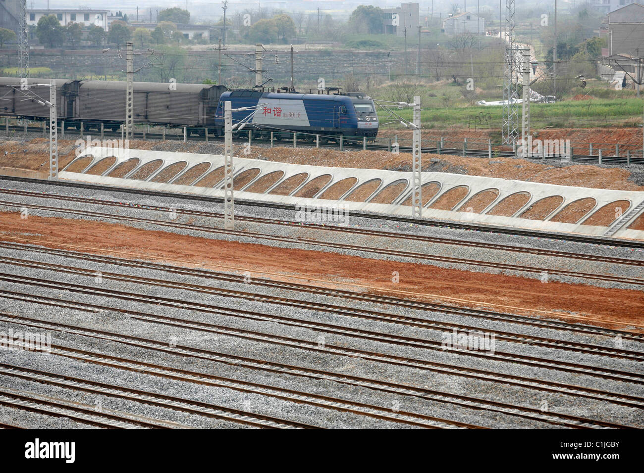 Chinese Supertrain Workers on China's new super high speed rail link ...