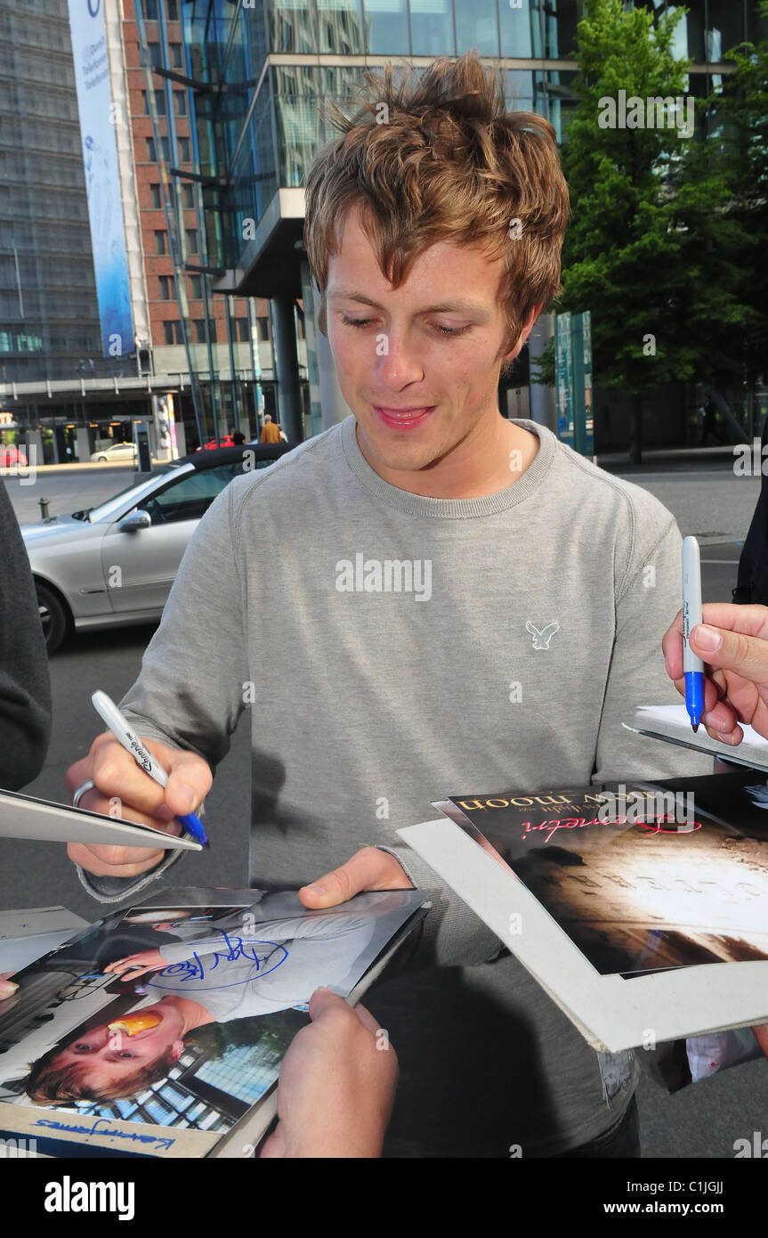 Charlie Brewley signing the photo outside Ritz Carlton Hotel which our ...