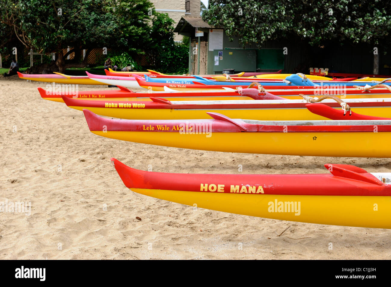 Yellow and Red Outriggers canoe on beach Kihei Maui Hawaii Pacific ...