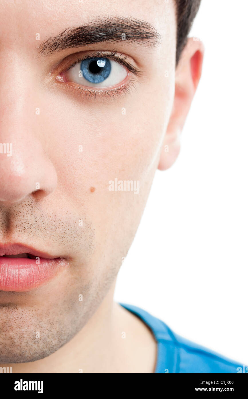 Close-up portrait of handsome young man with blue eyes Stock Photo - Alamy