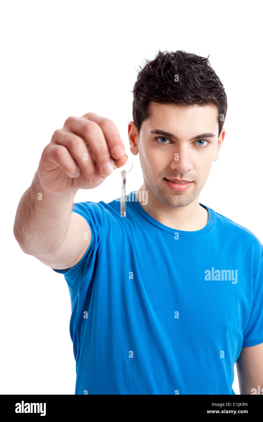 Portrait of a handsome young man holding the keys of your home Stock ...