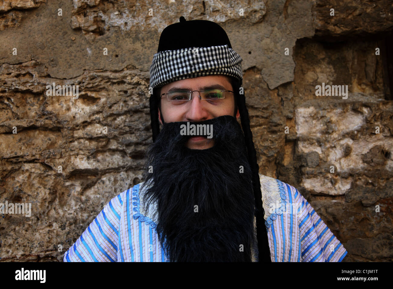 An Ultra Orthodox Jew wearing costume during Purim festival in the ...