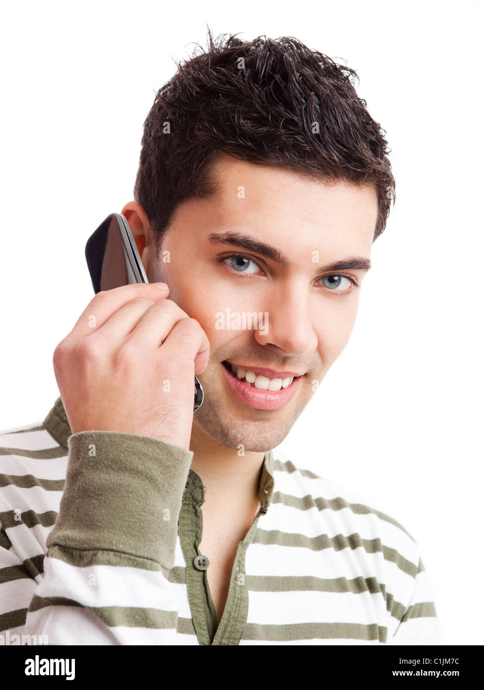 Handsome young man making a phone call, isolated on white background ...