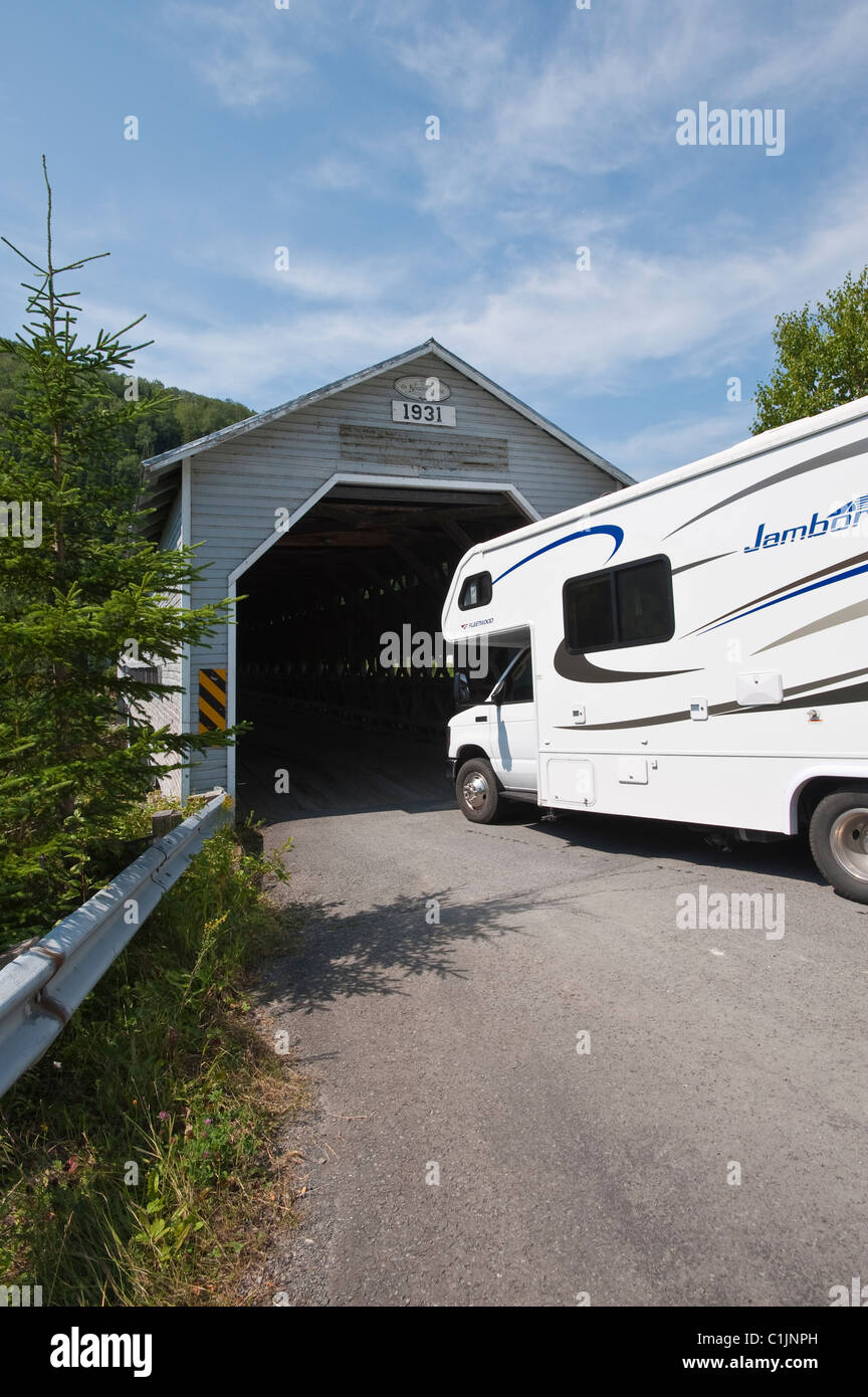 Quebec, Canada. De Routheirville covered bridge over the Matapédia ...