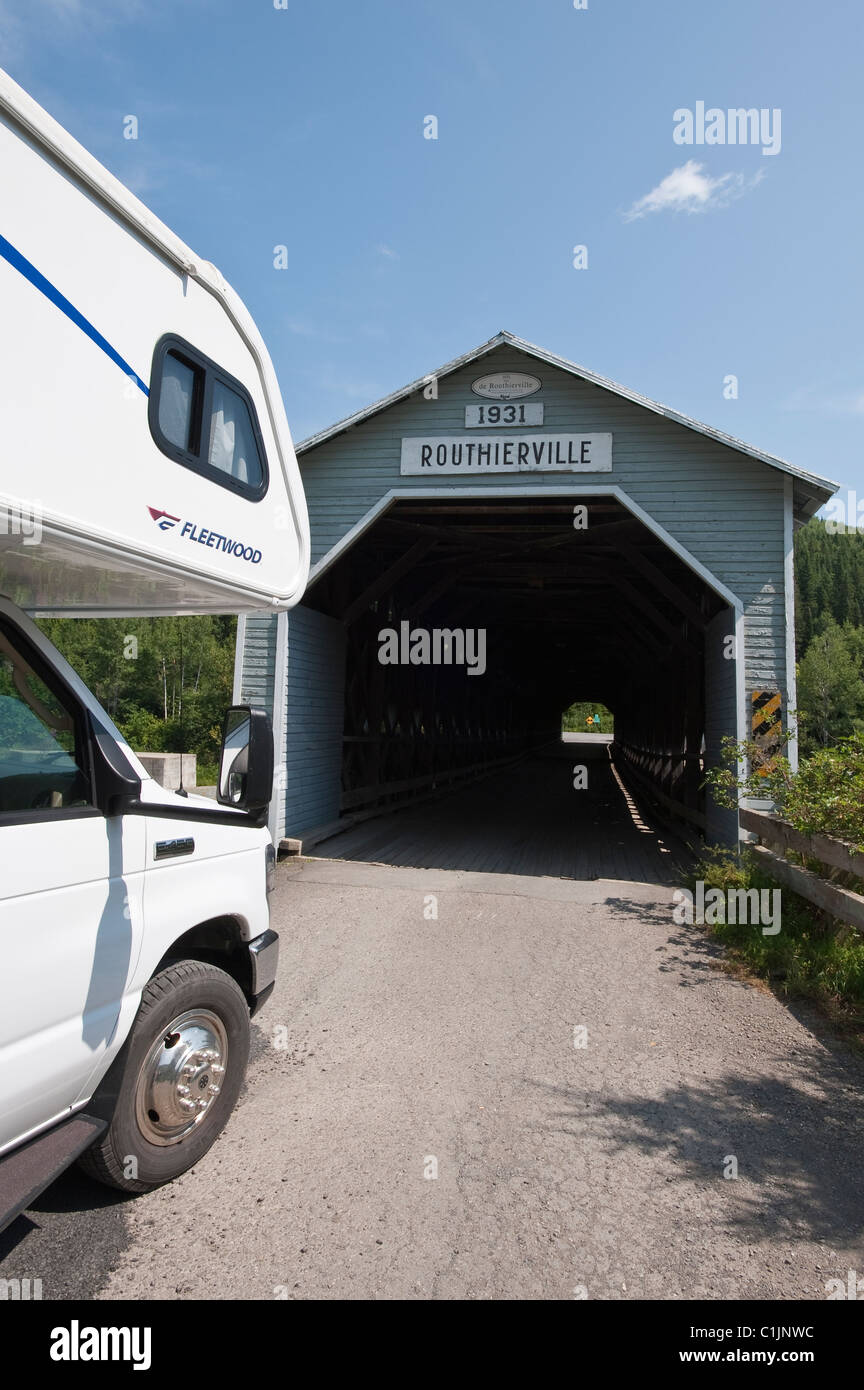 Quebec, Canada. De Routheirville covered bridge over the Matapédia ...
