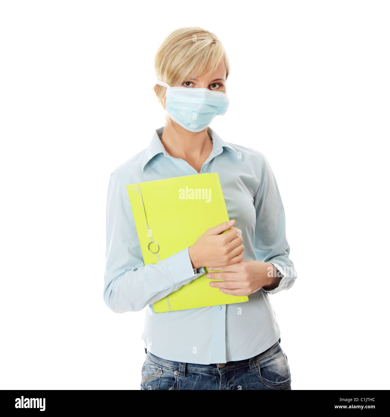 Young caucasian student woman with mask on her face. She is defending ...