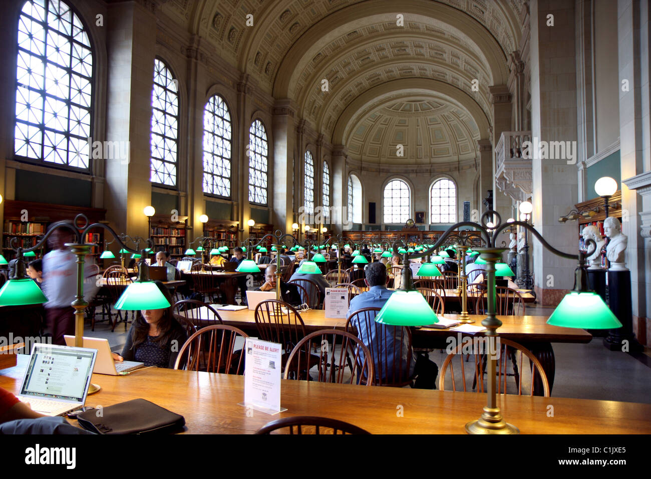 Interior of the public library in Boston and a students reading a books ...