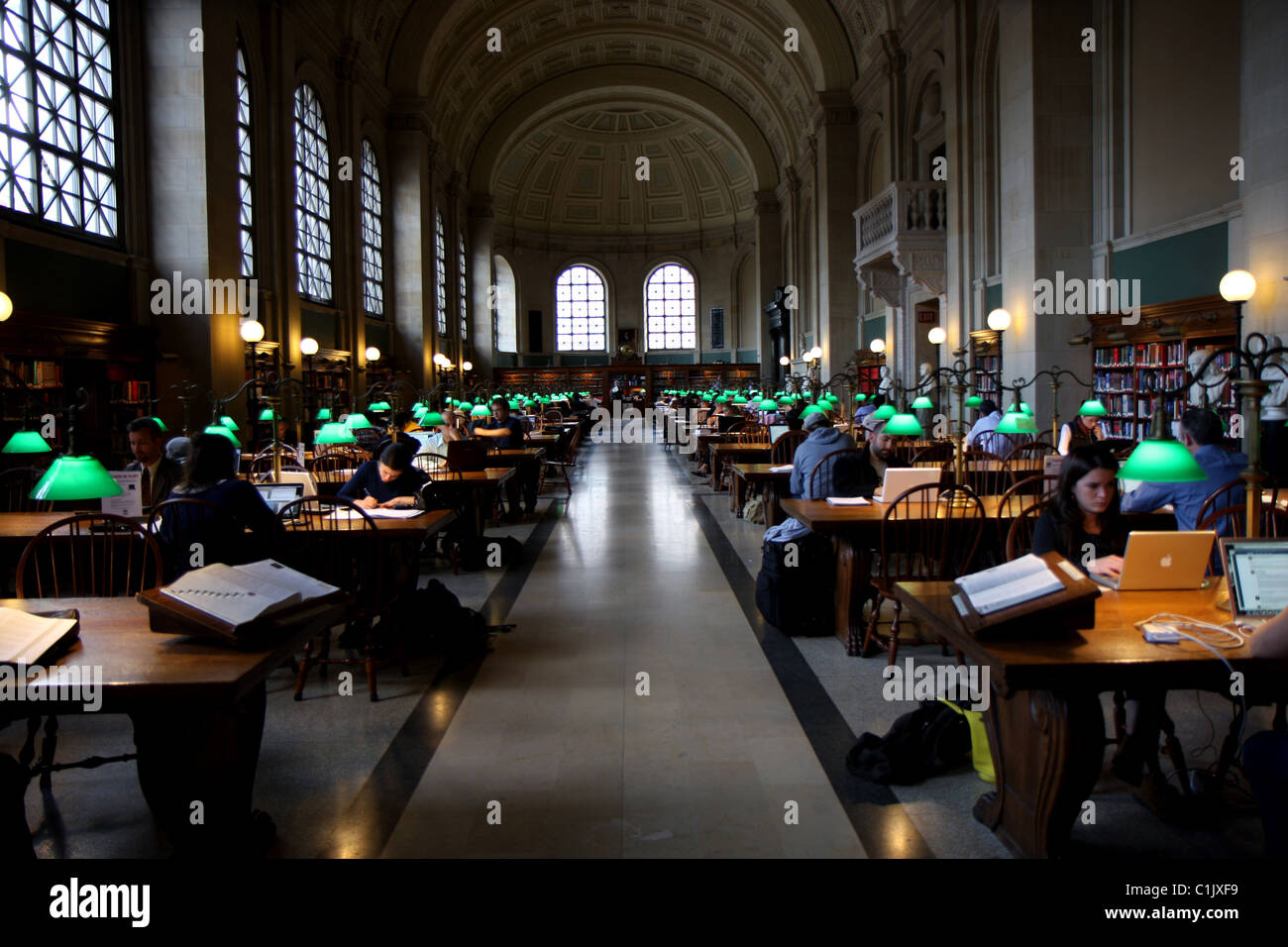 Interior of the public library in Boston and a students reading a books ...