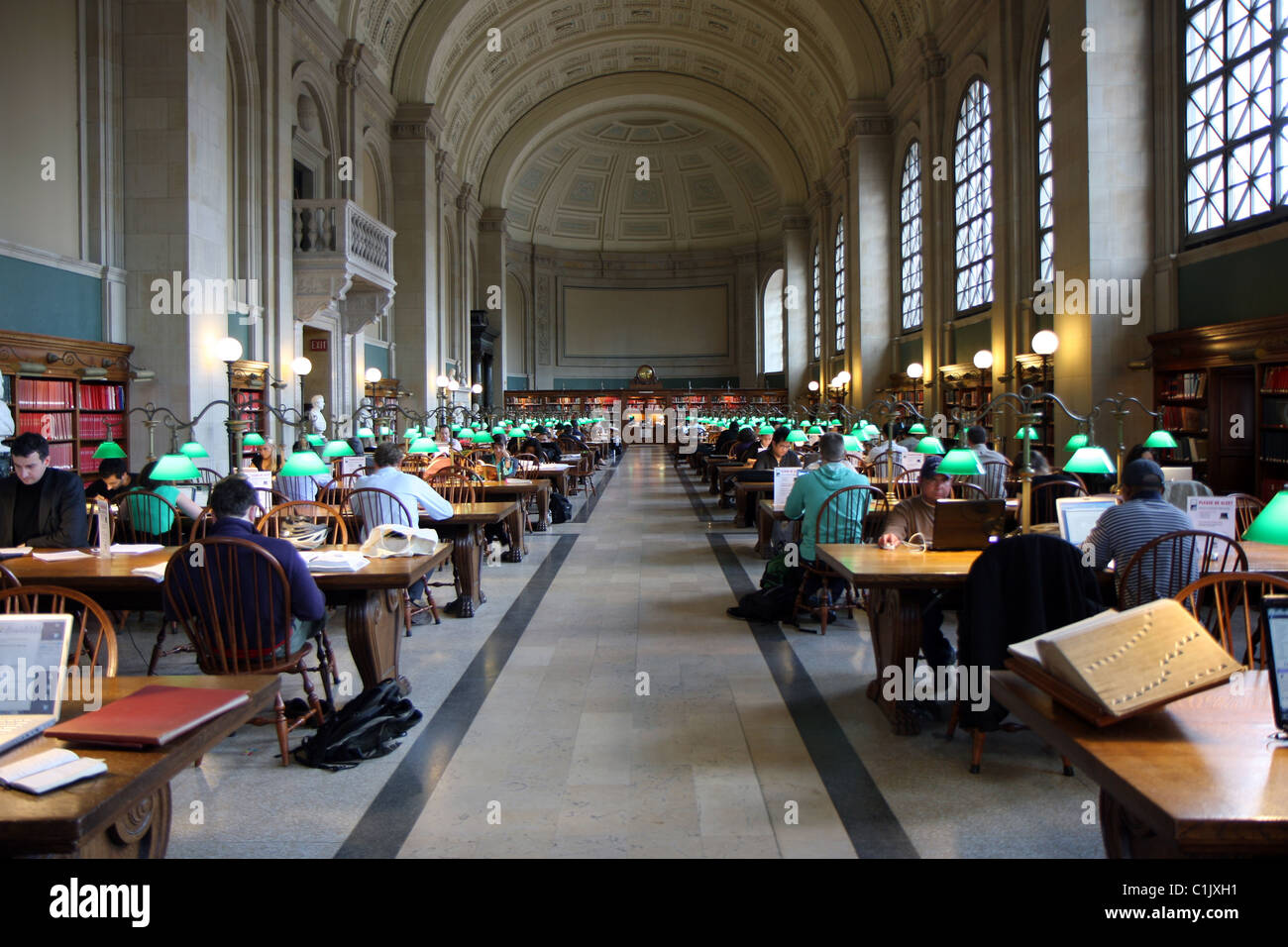Interior of the public library in Boston and a students reading a books ...