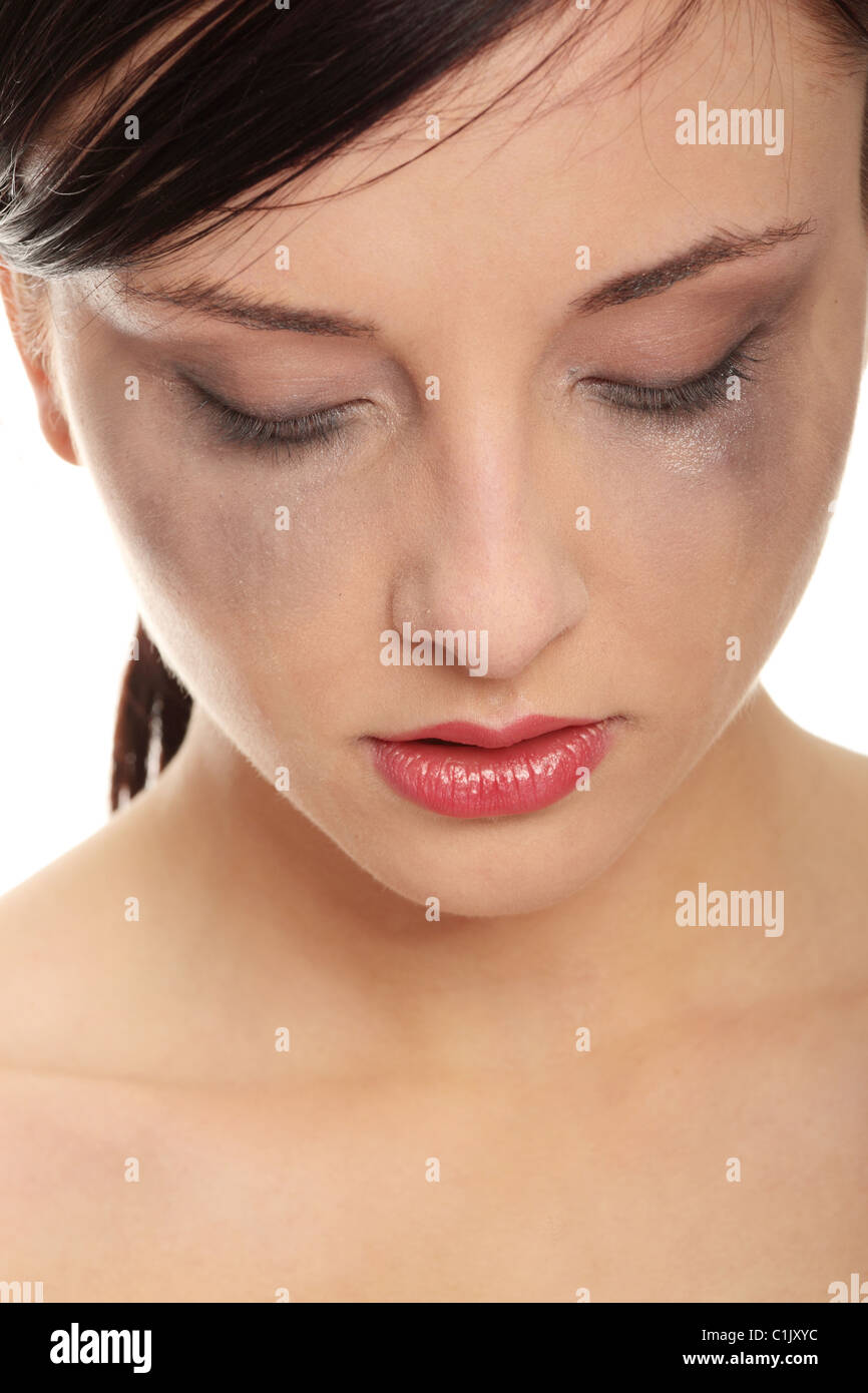 Abused woman crying over white background Stock Photo - Alamy